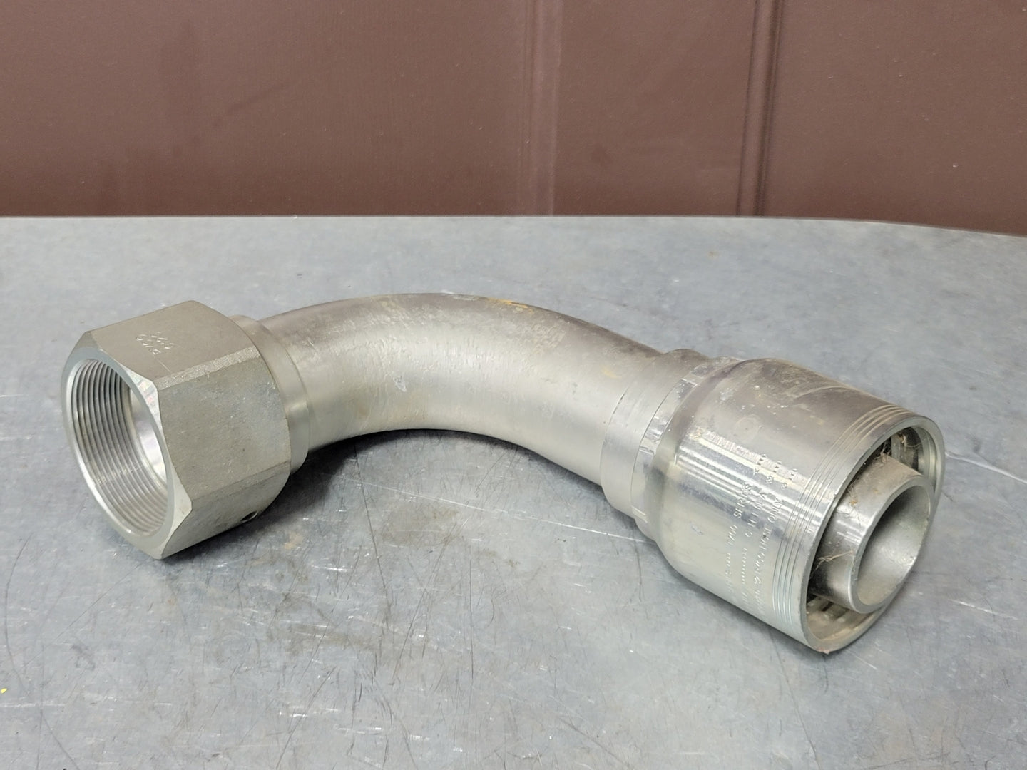 Bitelok 2" 90 deg One-Piece Crimp Hose Coupling Flare Type T700